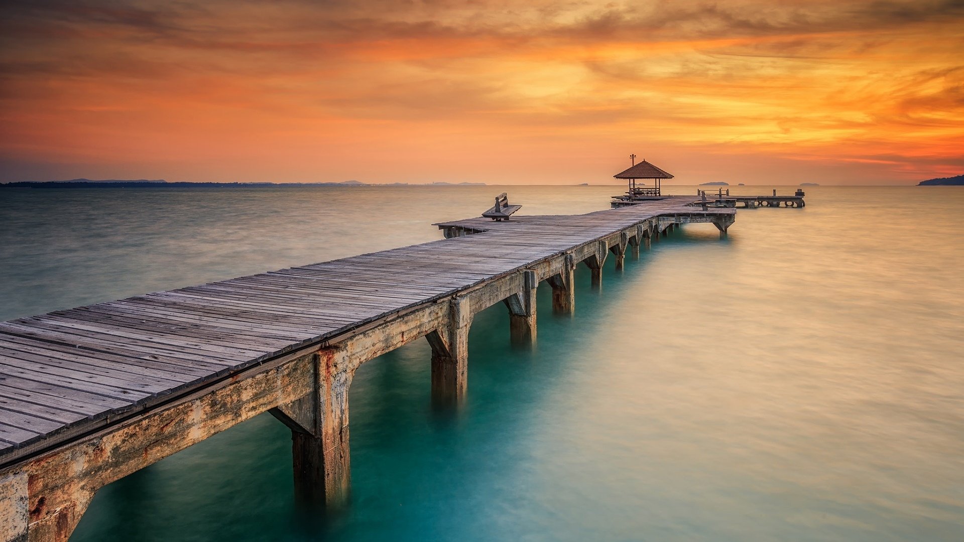 Serene Sunset Pier Over Ocean - HD Man-Made Waterfront Wallpaper