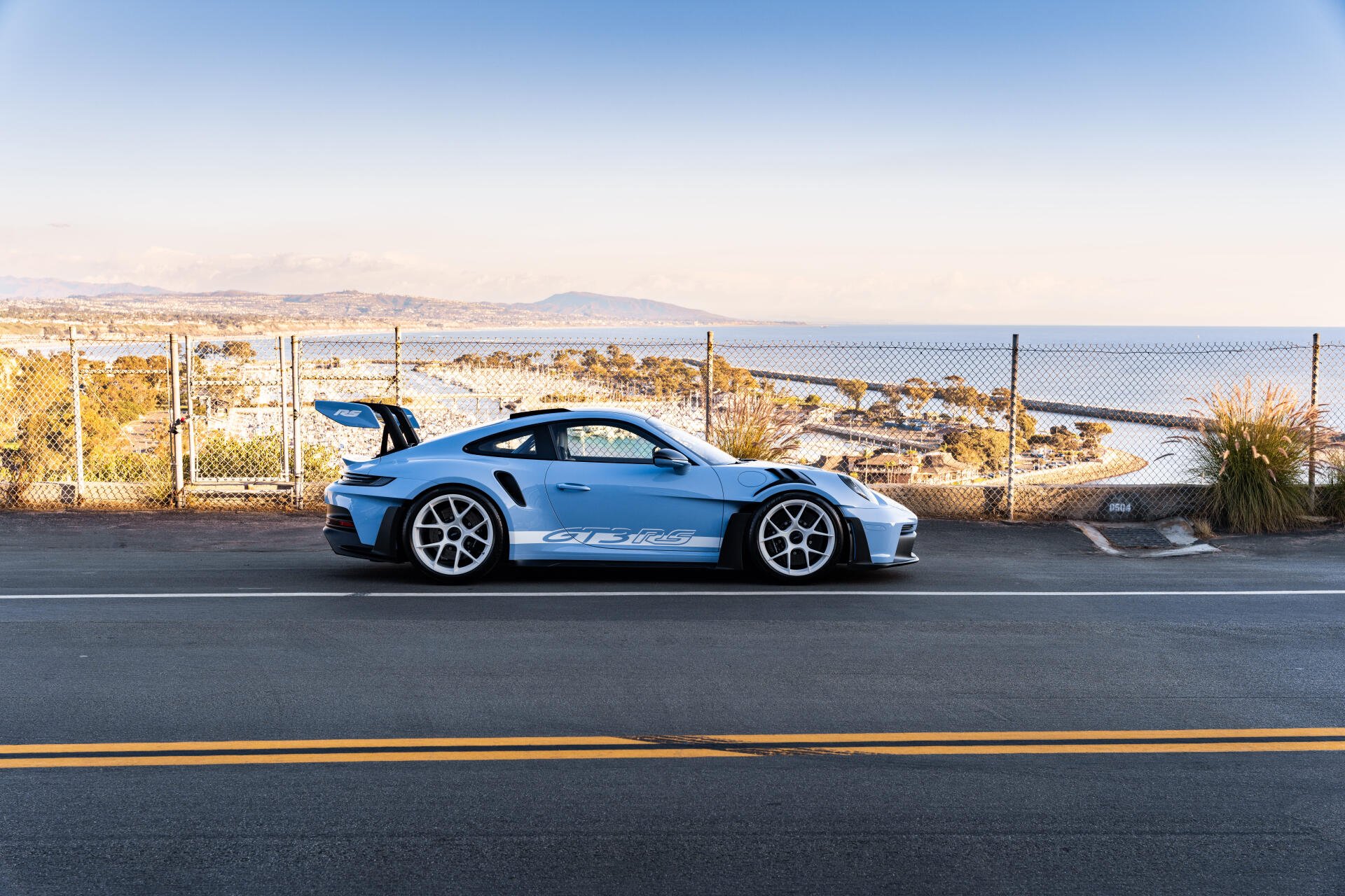 8K Ultra HD Porsche Racing Beauty on Scenic Coastal Road