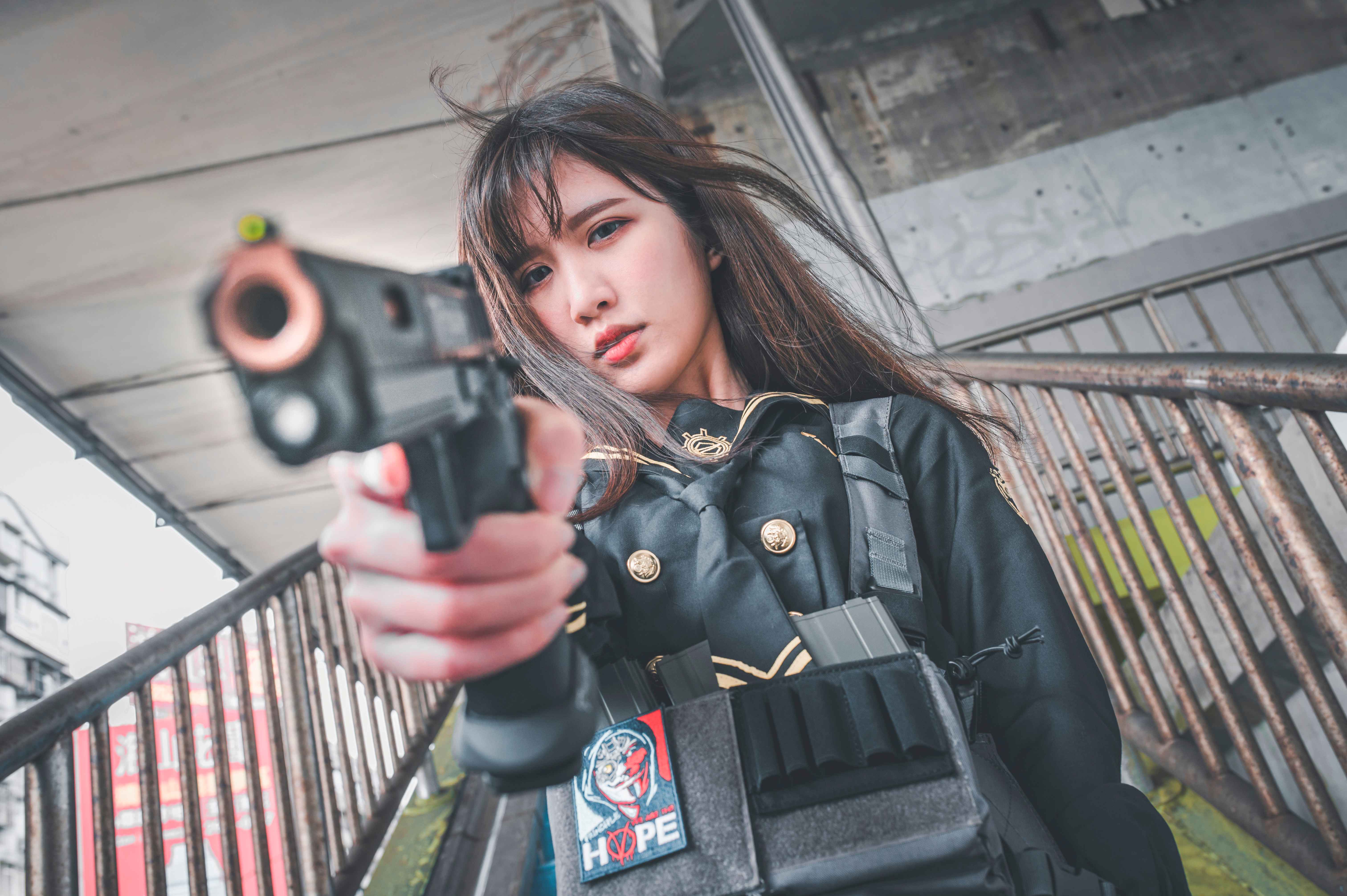 Download Asian Woman Gun 4k Ultra HD Wallpaper