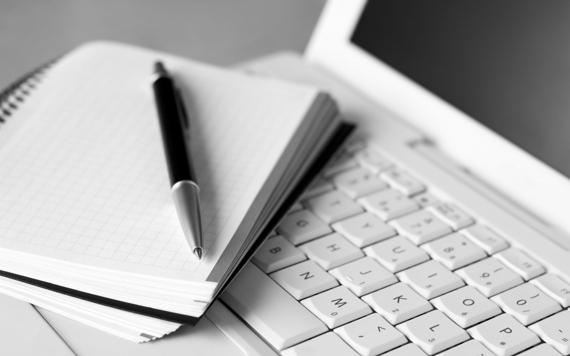 Tech Workspace HD: Sleek Computer & Notes Wallpaper