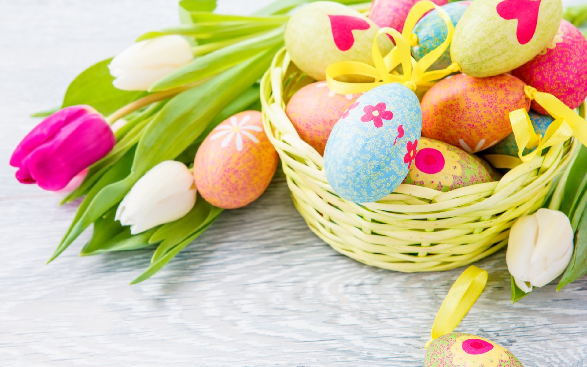 Easter Holiday HD Wallpaper: Vibrant Eggs and Tulips Celebration