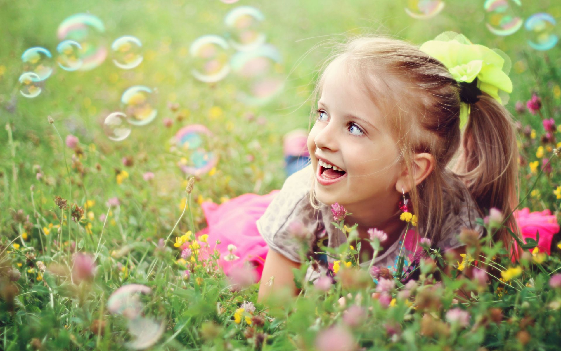 Joyful Childhood: HD Photography of a Little Girl in a Bubble-Filled Meadow
