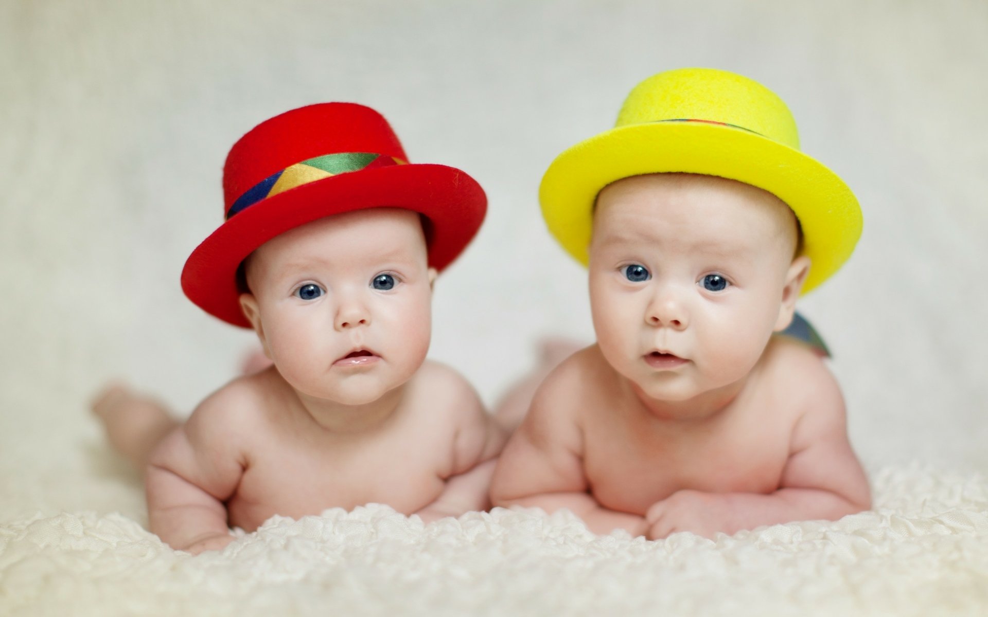 HD Baby Portrait: Adorable Twins in Colorful Hats