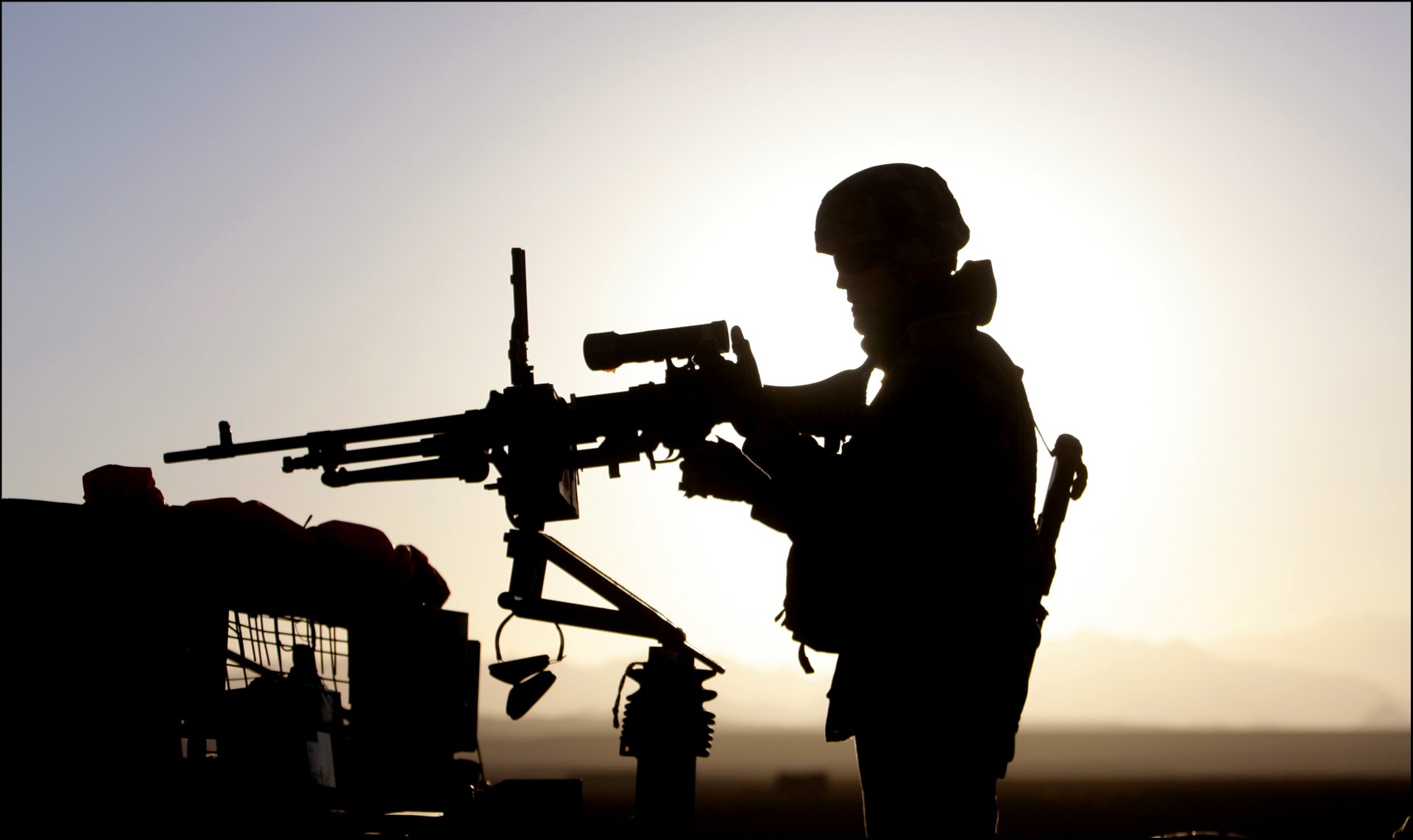 4K Ultra HD Soldier Silhouette: Military Strength at Dawn