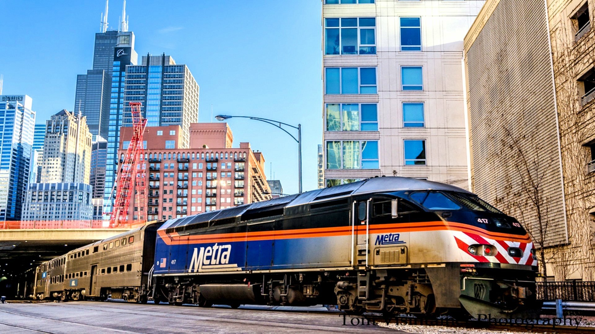 HD Metra Train Journey Through the Urban Skyline by Adnan Akhtar