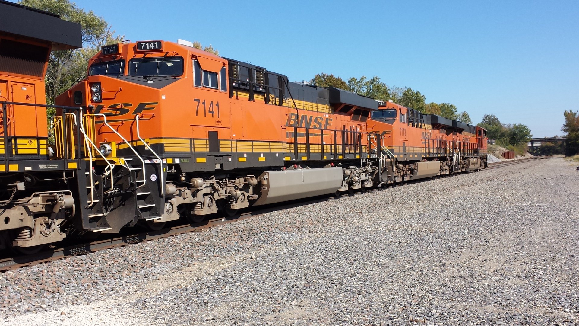 Sunlit Orange Freight Train — 4K Ultra HD Wallpaper