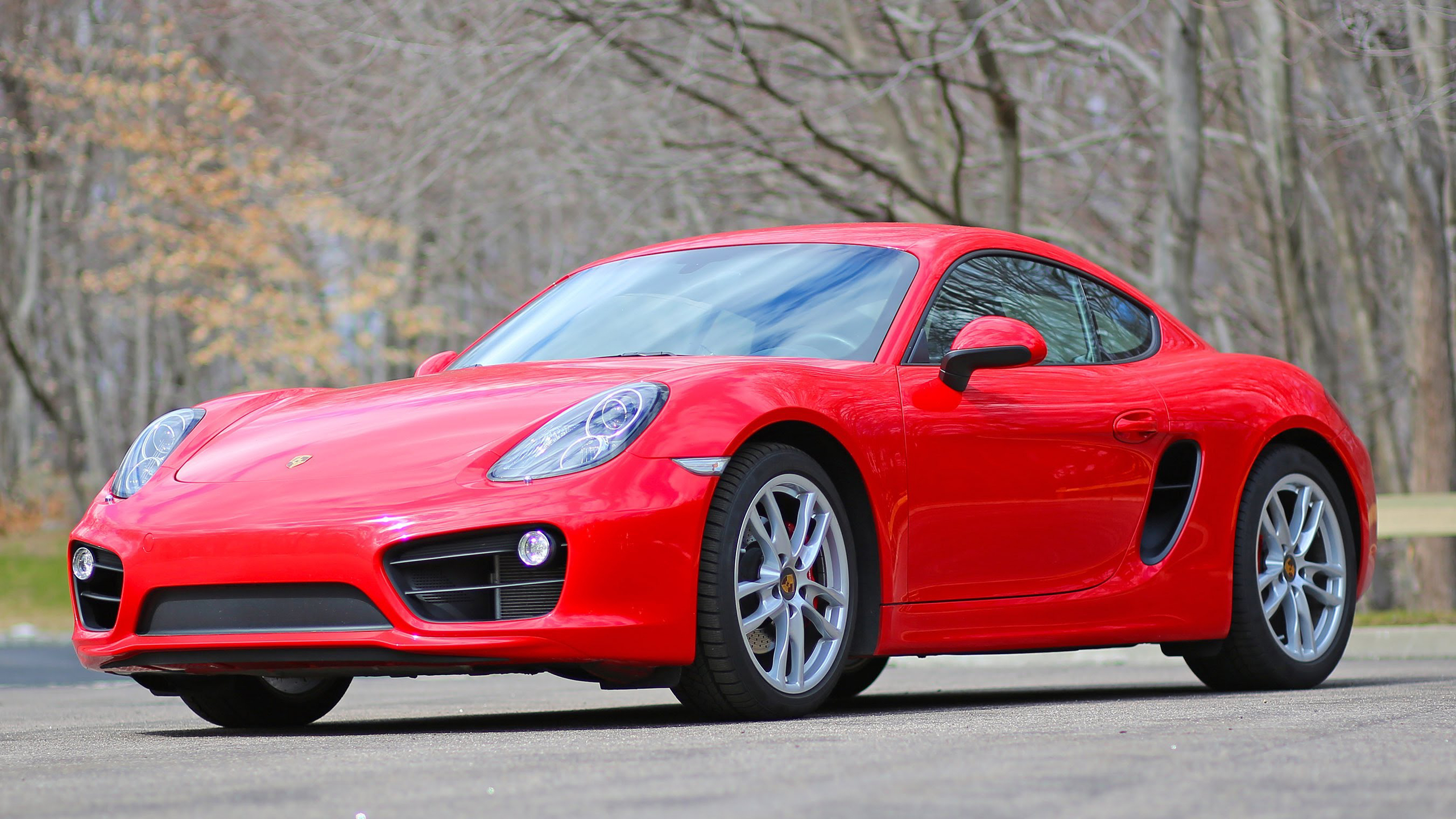 Porsche Cayman S HD Wallpaper – Sleek Red Sports Car in Motion