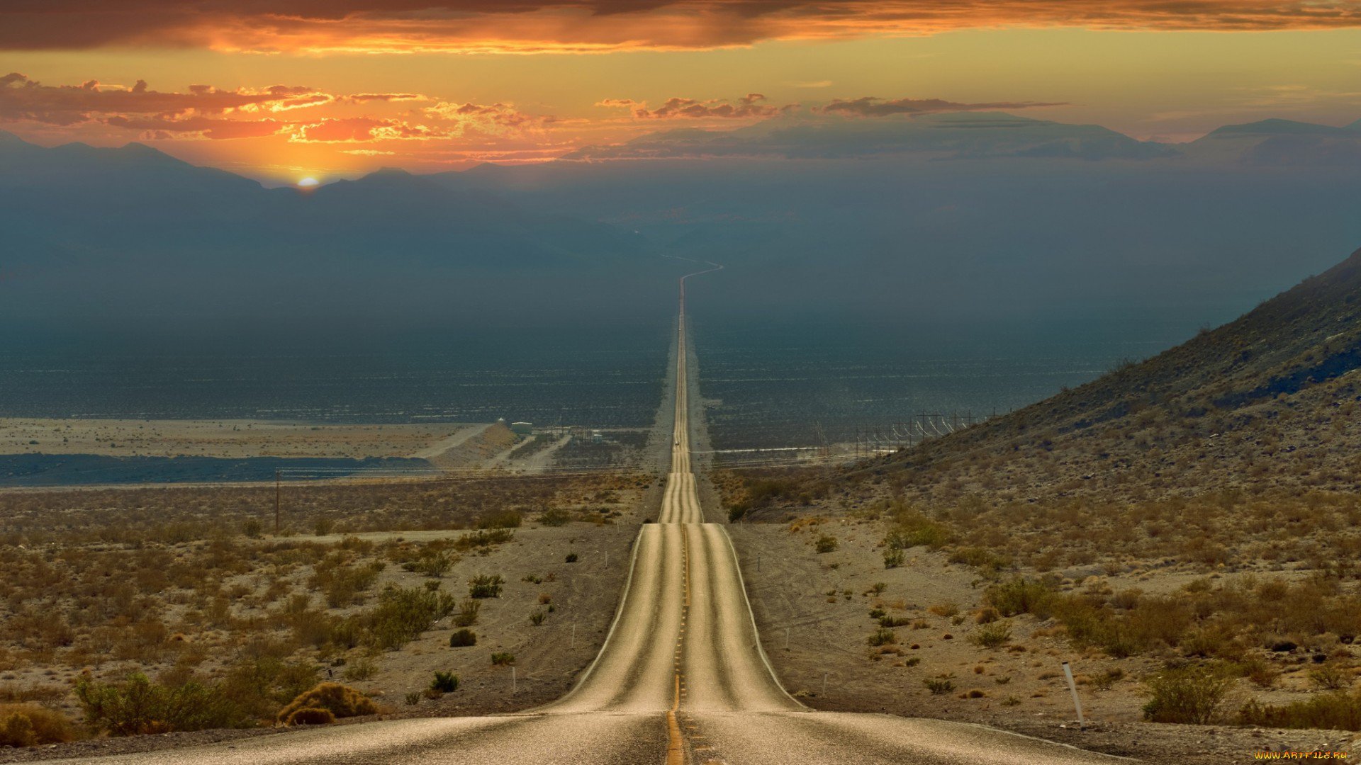 Endless Horizon: Man-Made Road at Sunset | HD Wallpaper