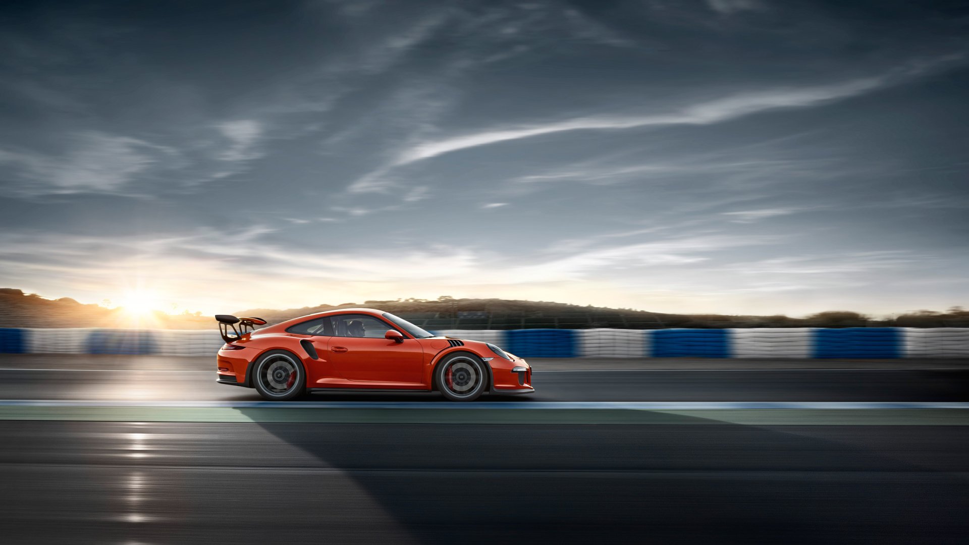 Stunning Orange Porsche 911 GT3 RS HD Wallpaper on the Track