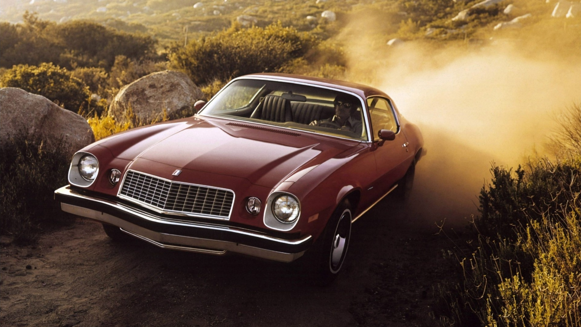 HD Wallpaper: Classic Chevrolet Camaro Roaring Through the Wild