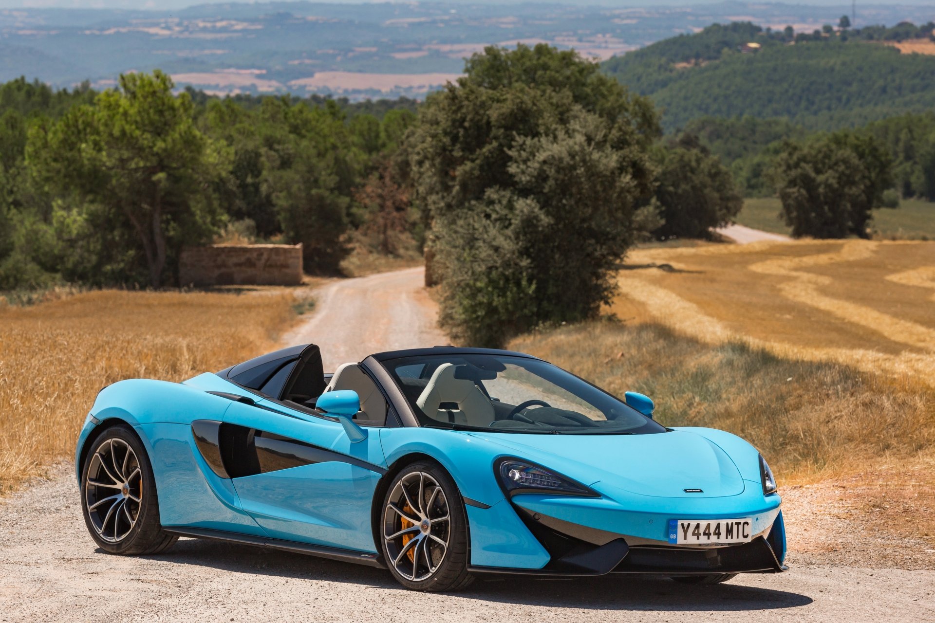 McLaren 570S Supercar in 4K Ultra HD - Blue Speed Machine on Scenic Road
