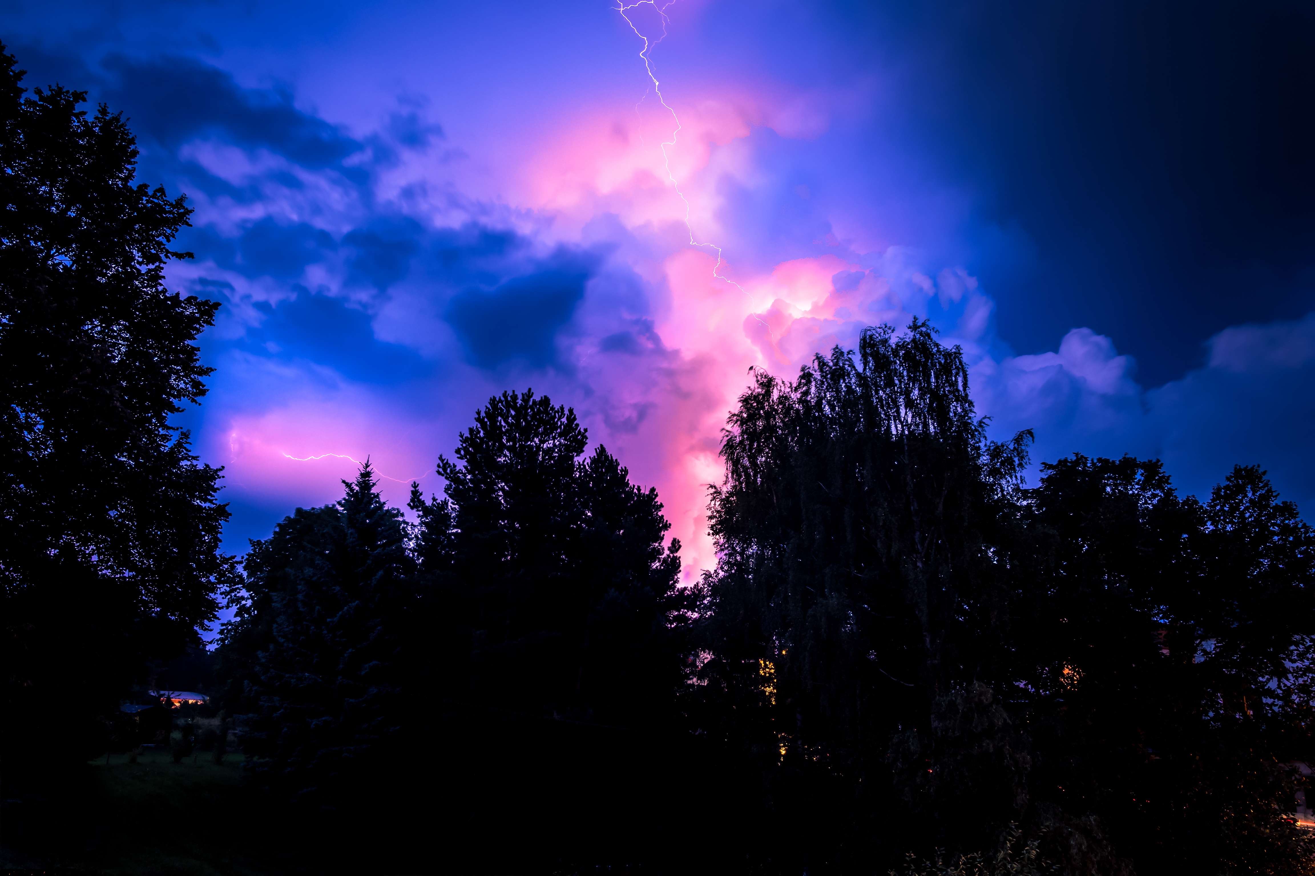 4K Ultra HD Night Storm: Blue Sky Lightning Over Pink Sunset Forest